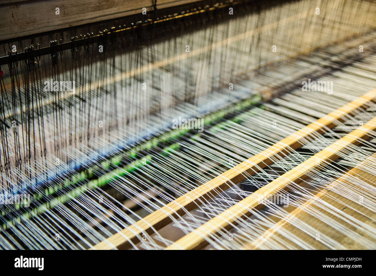 PLAYA DEL CARMEN, Mexico — Close-up of a weaving loom at Xcarat Maya ...