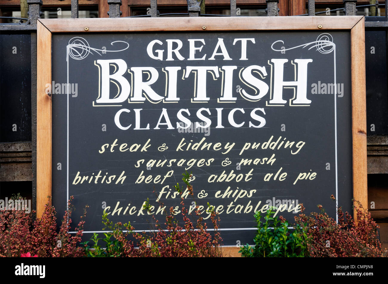A blackboard advertising classic british pub food Stock Photo - Alamy