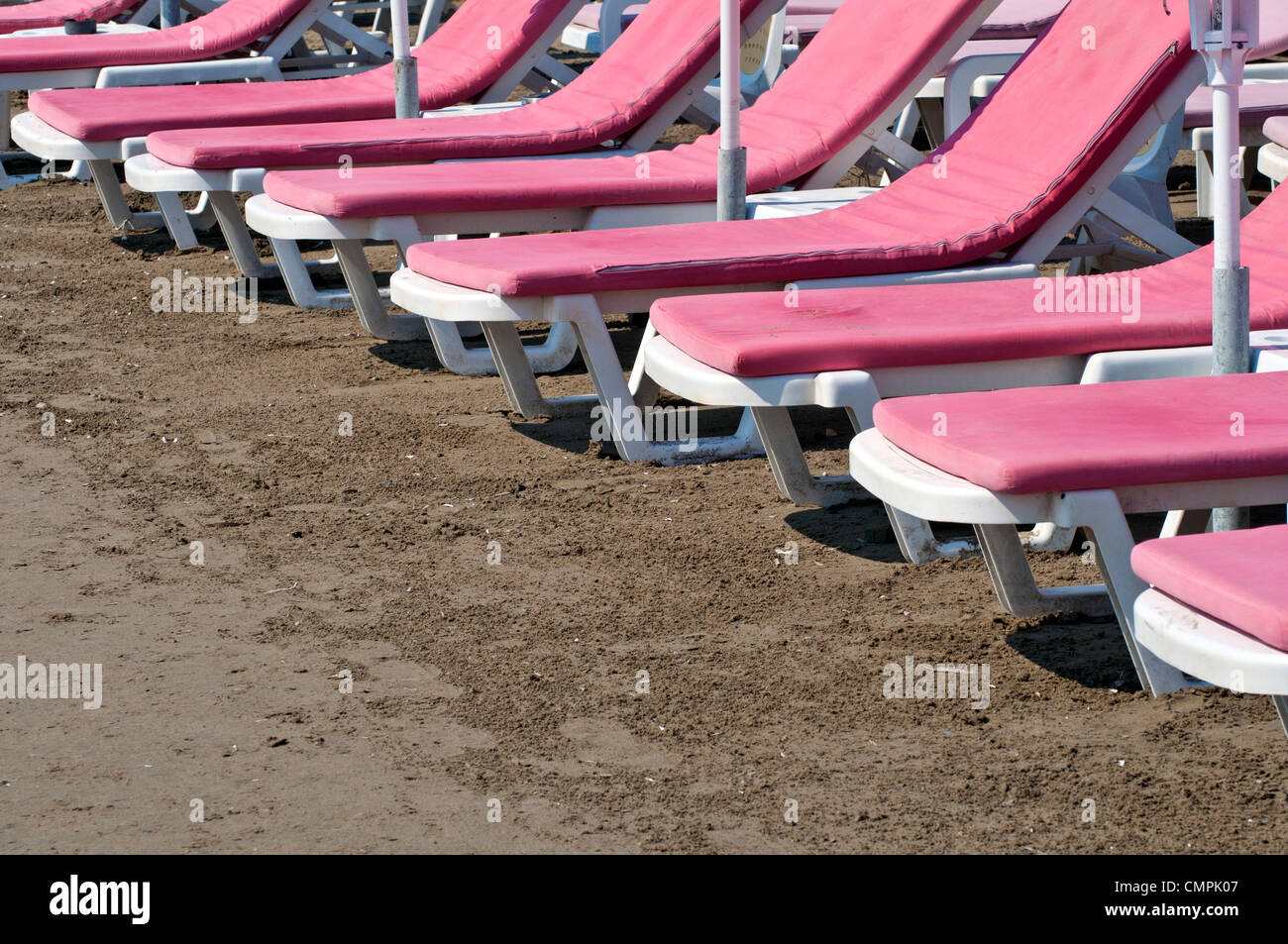 Sunbeds at beach Stock Photo - Alamy