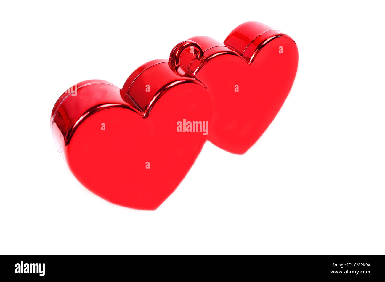 Two red hearts isolated on white Stock Photo - Alamy