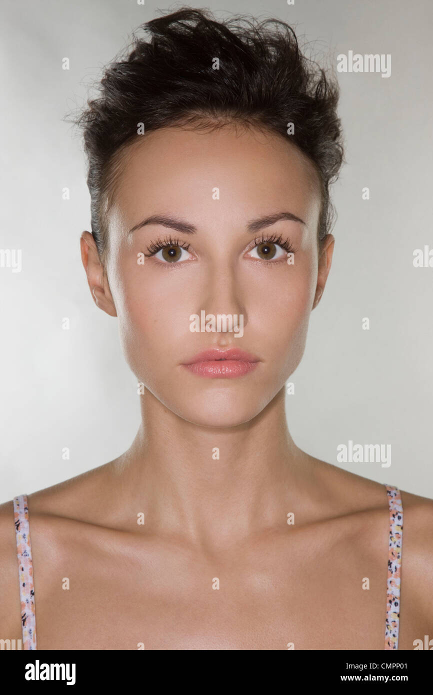 Portrait of serious young woman Stock Photo - Alamy