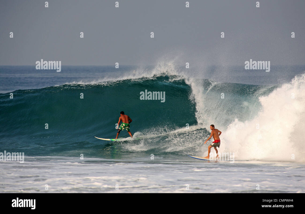 Surfing at Zicatela Beach in Puerto Escondido. The famous surf beach is ...