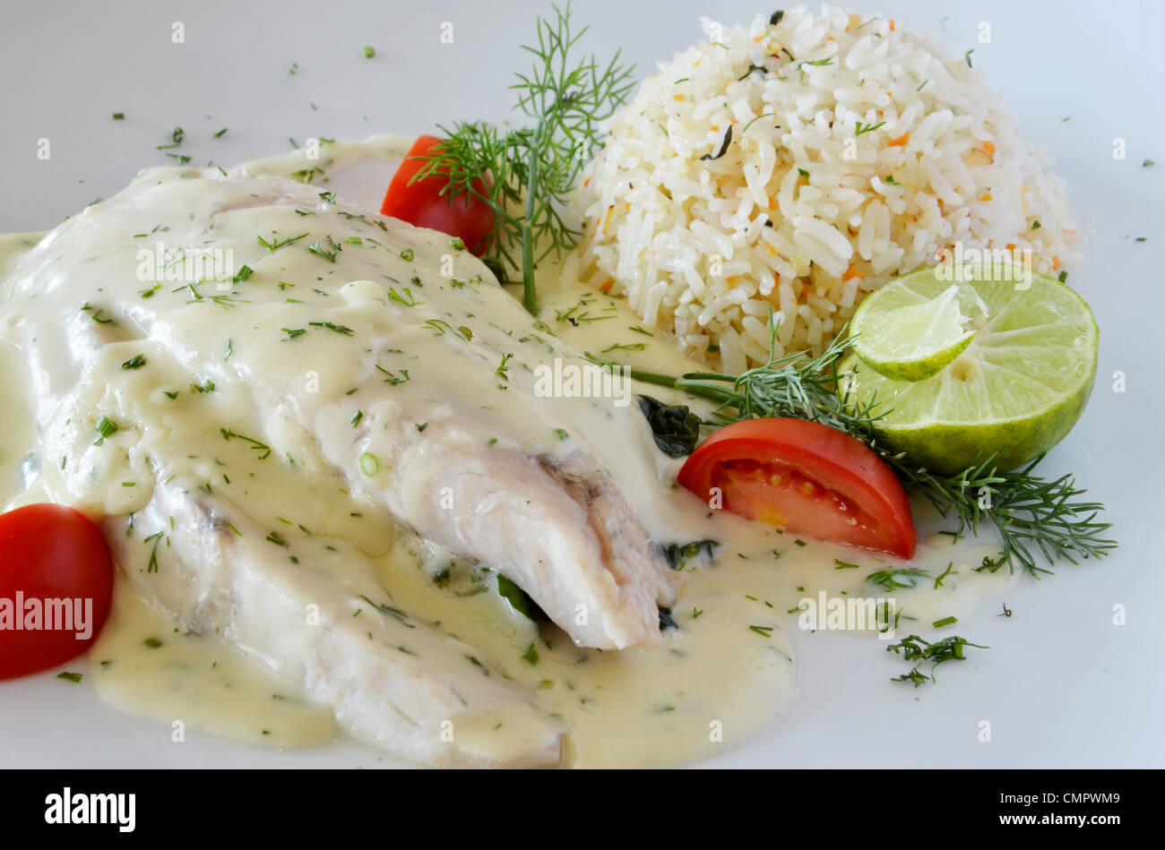 steak from fish with creamy sauce Stock Photo - Alamy
