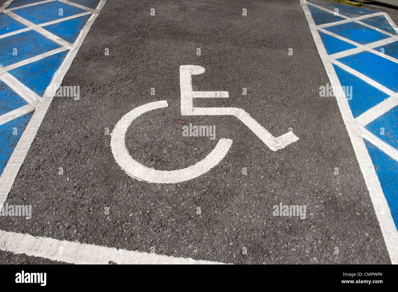 a disabled parking bay with wheelchair sign and parking distance ...