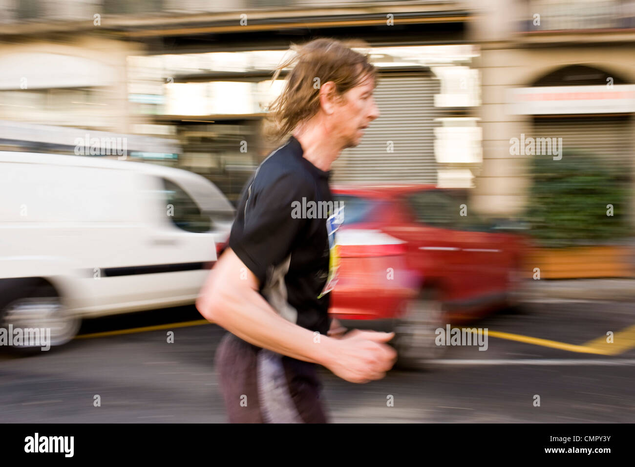 Marathon runner in Barcelona, Spain (2012 Stock Photo - Alamy