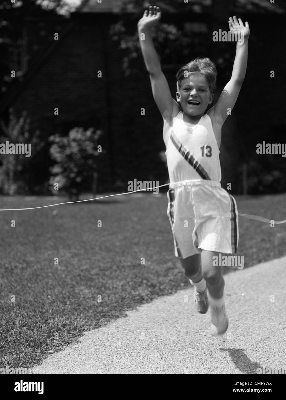 Athlete finish line Black and White Stock Photos & Images - Alamy