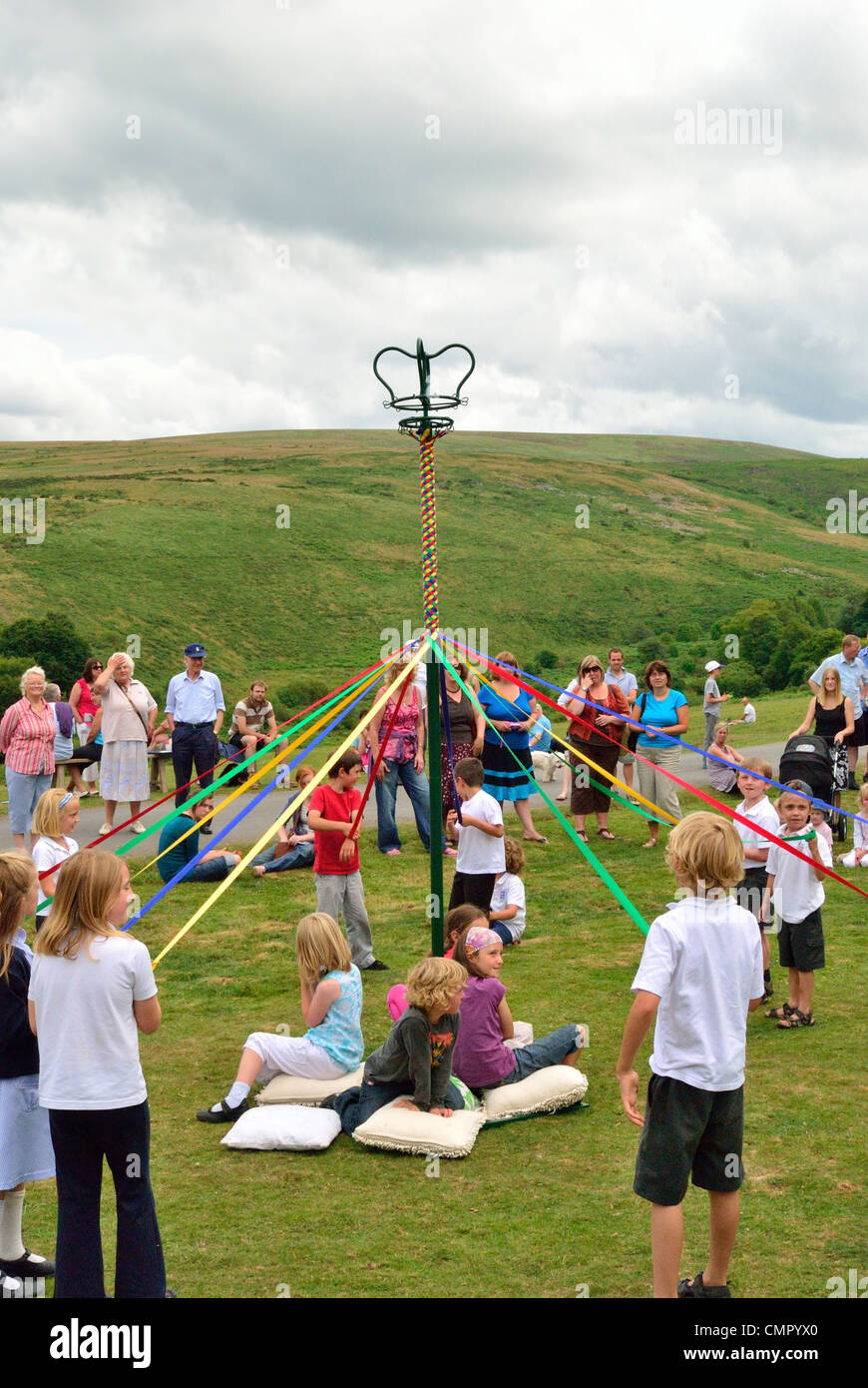 Maypole dancers at a village fete on the edge of moorland Stock Photo ...