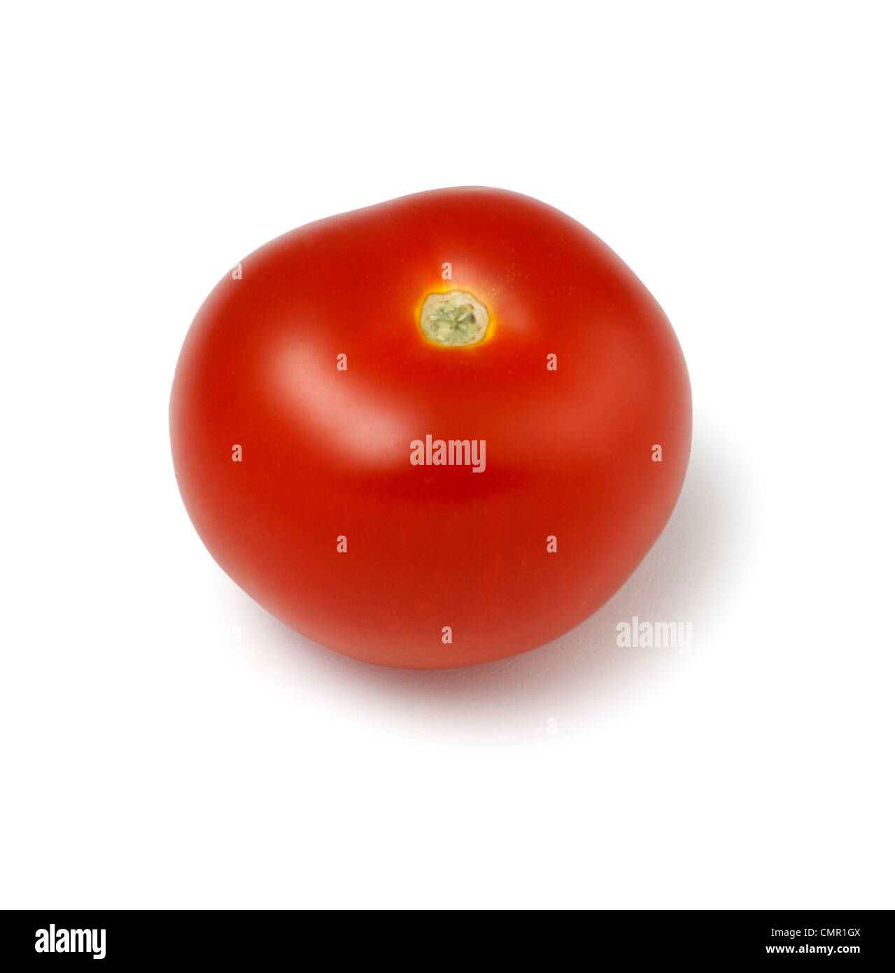 one Tomato cut out on a white background Stock Photo - Alamy