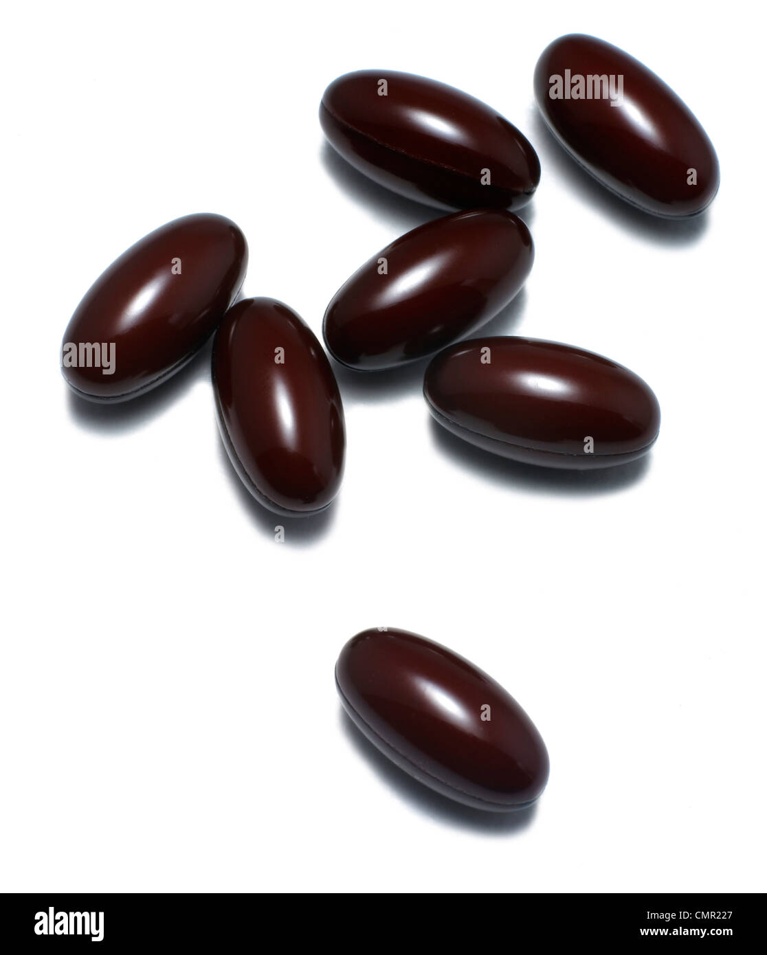 Seven Vitamin Pills Stock Photo - Alamy