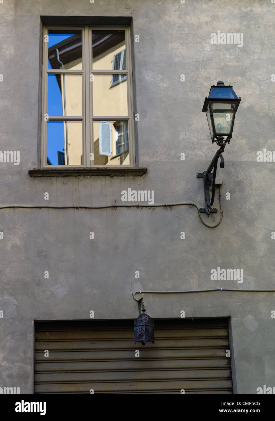 Side street lamp and window reflection - Turin, Italy Stock Photo - Alamy