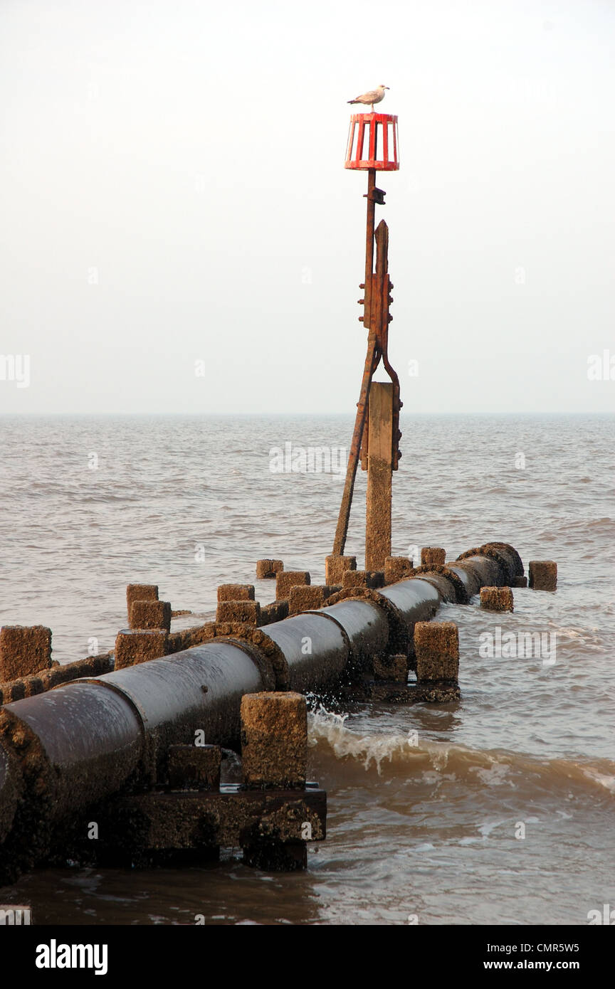 Surface water outfall pipe on the beach at Mundesley, Norfolk, UK Stock ...
