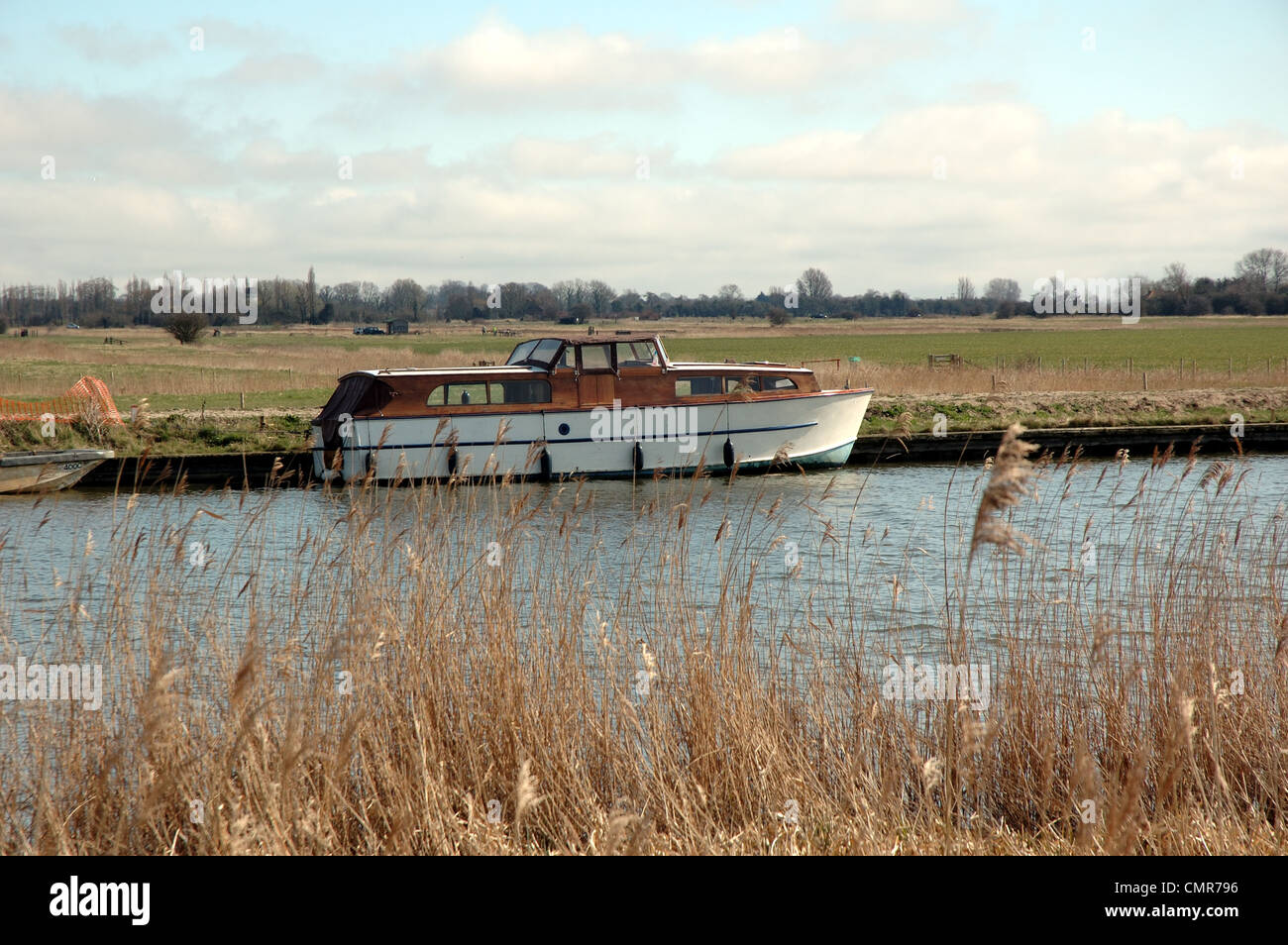 Traditional wooden Broads cruiser on the River Bure near Acle, Norfolk ...
