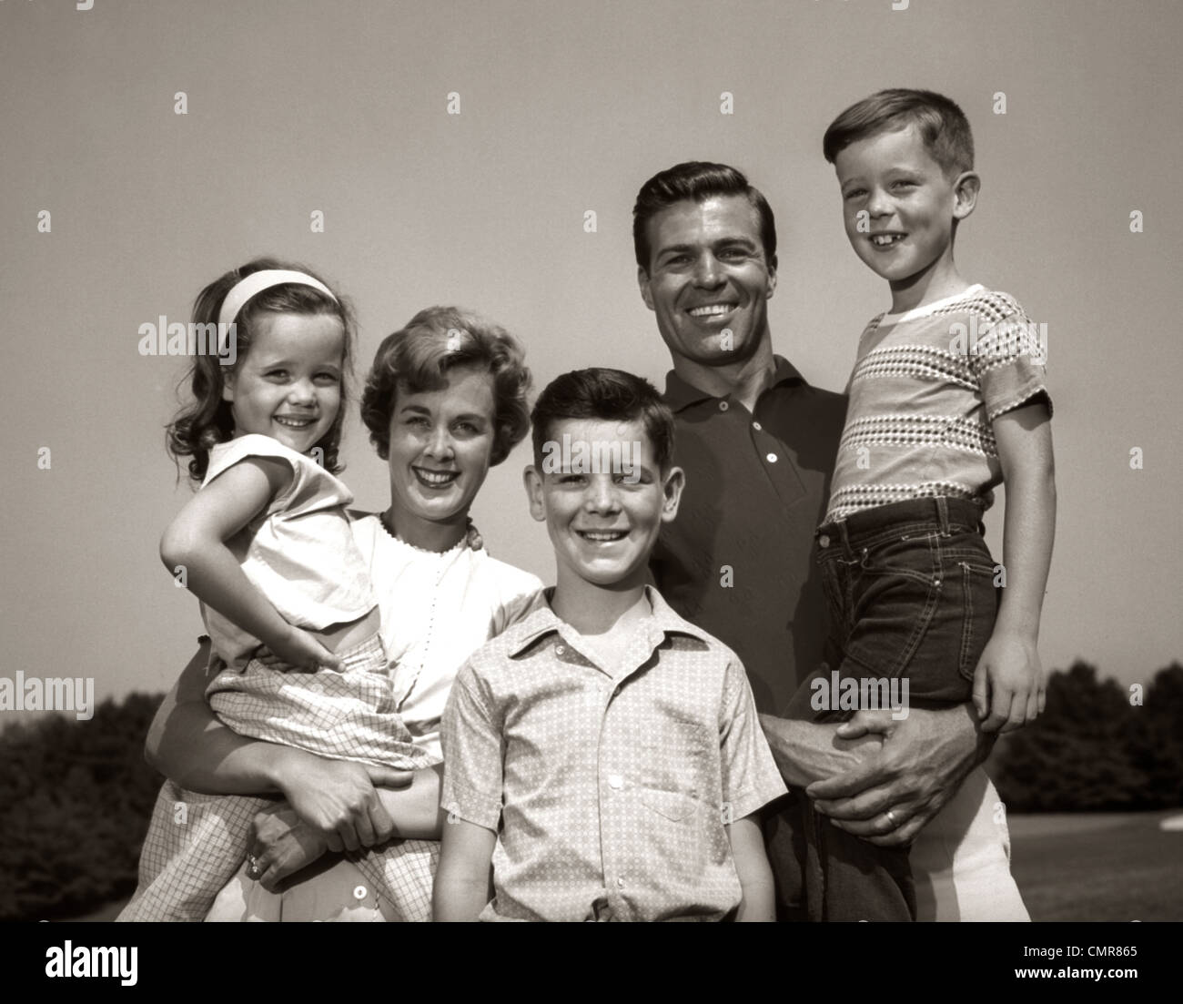 1960s FAMILY PORTRAIT OUTDOORS FATHER MOTHER THREE CHILDREN Stock Photo ...