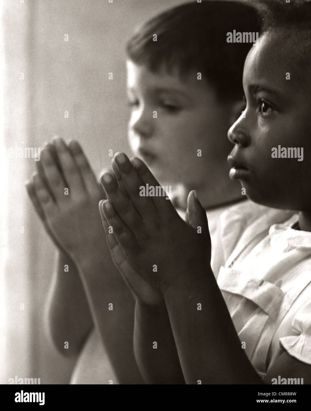 1960s 1970s TWO CHILDREN PRAYING SUNDAY SCHOOL Stock Photo - Alamy