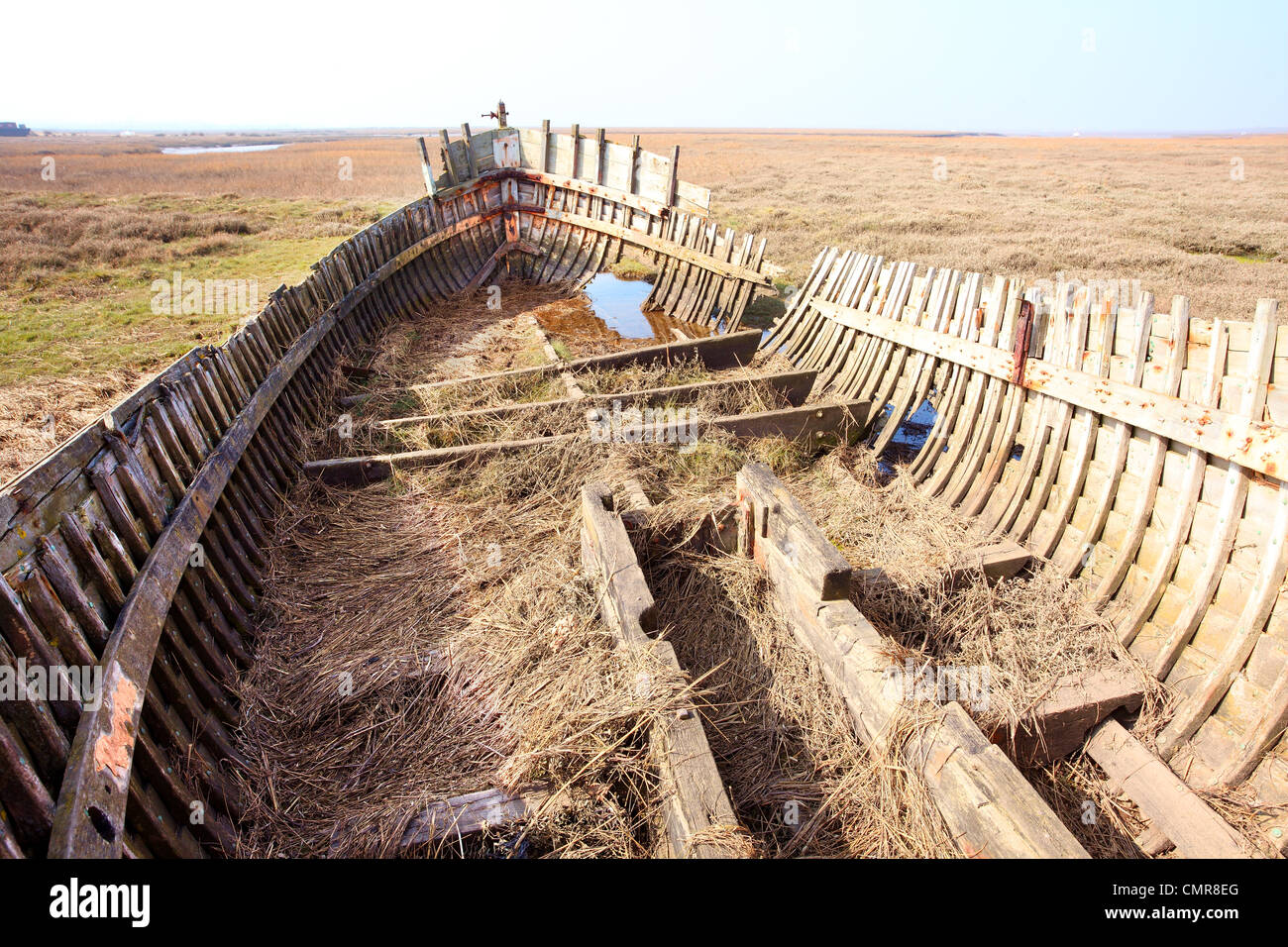 The skeleton of an old dilapidated and decaying boat left to rot on a ...