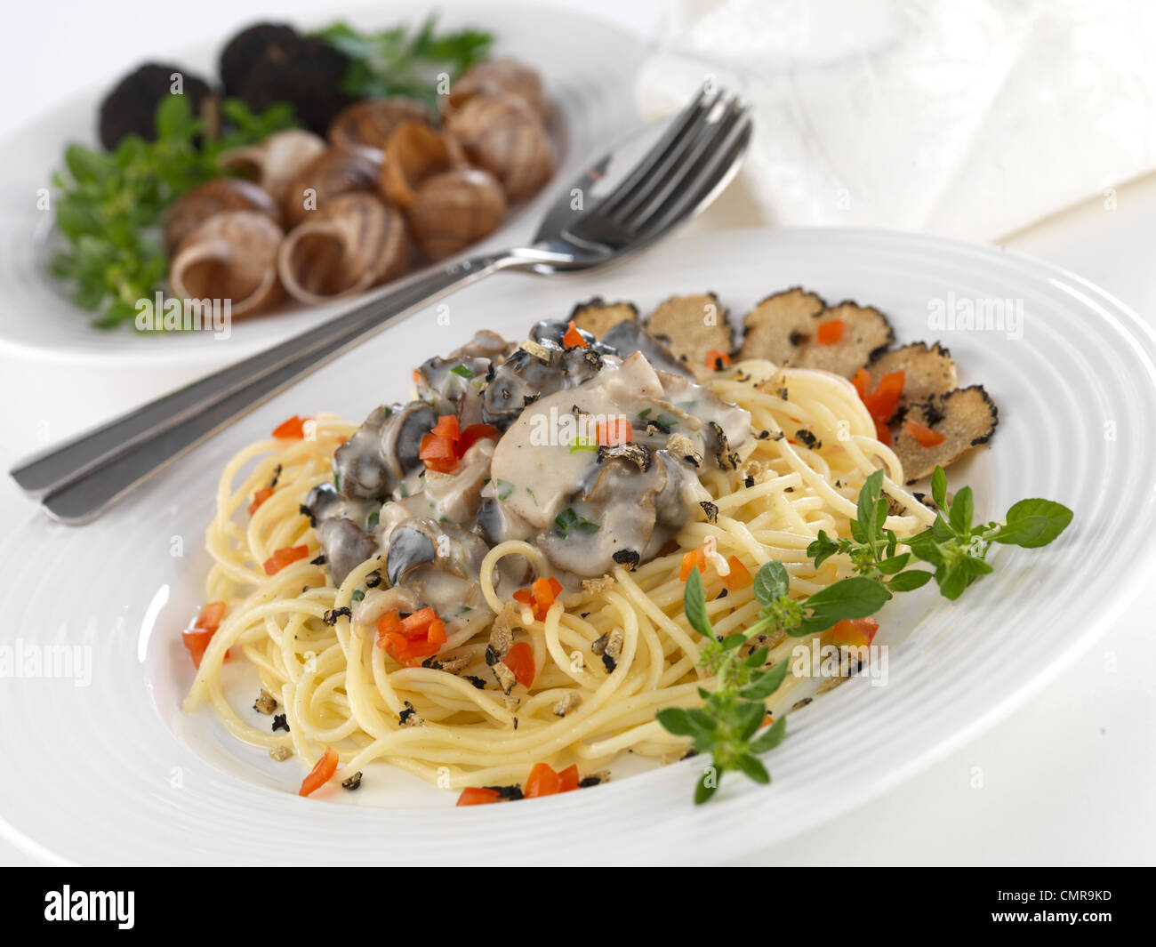 snail ragout on pasta Stock Photo - Alamy