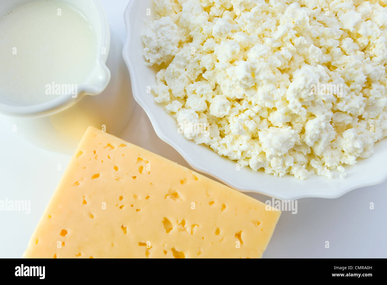 Dairy products on a white reflective background Stock Photo - Alamy