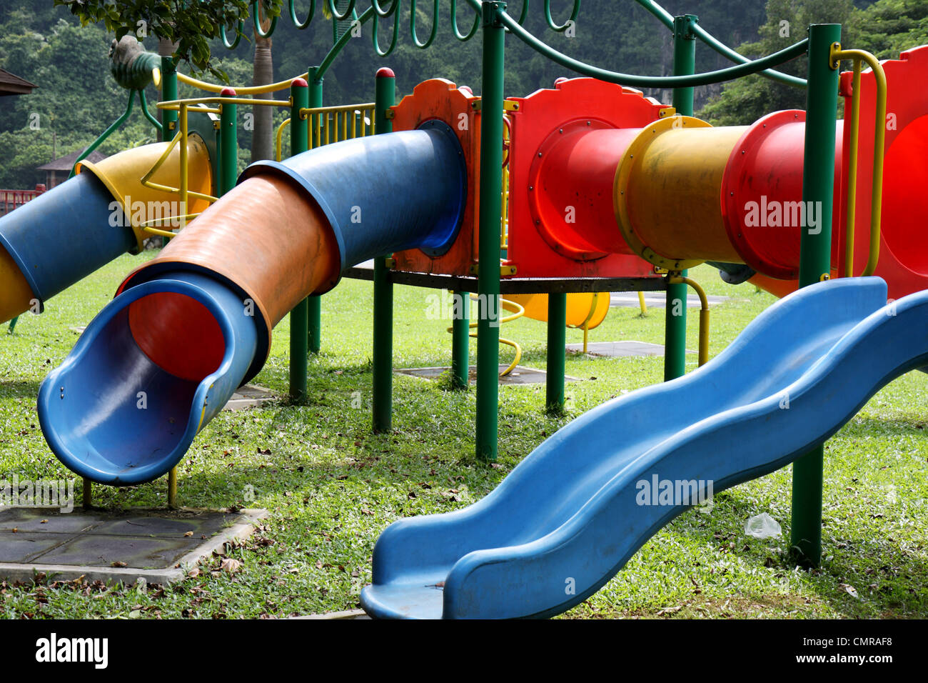 Colorful slides at the children's playground Stock Photo - Alamy