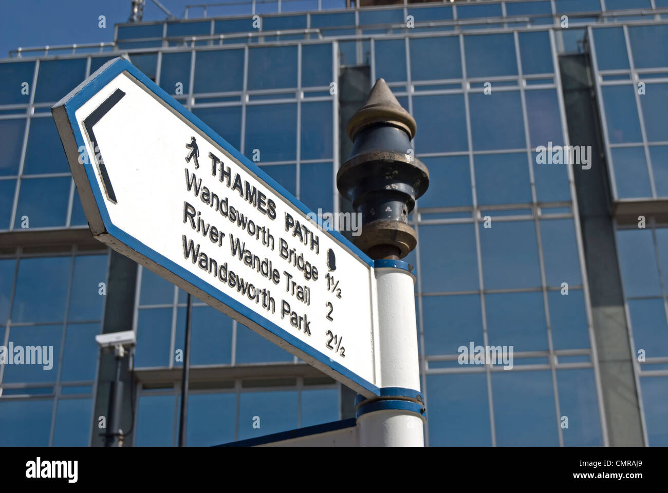 thames path sign in battersea, london, england, with directions for ...