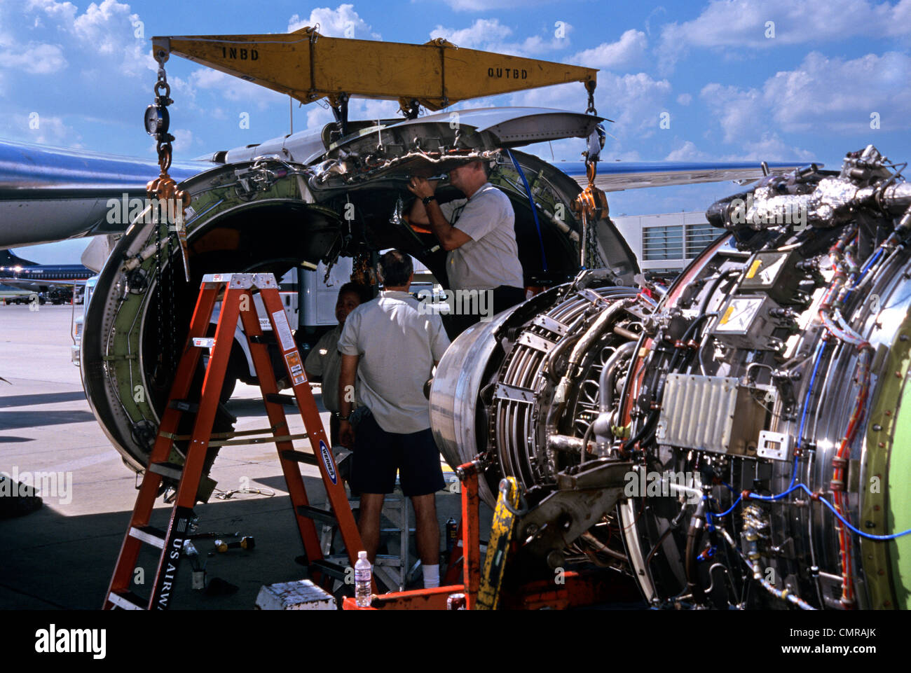 1990s HANGING AN ENGINE ON A BOEING 737-300 JET AIRPLANE Stock Photo ...