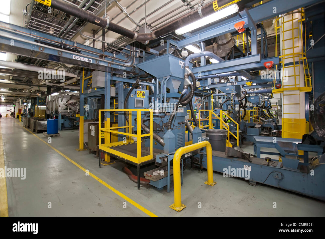 Money factory coins hi-res stock photography and images - Alamy