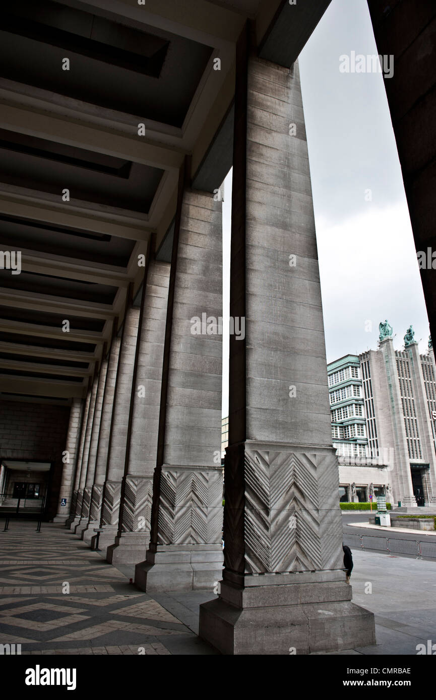 Pillars along a side, covered walkway outside of the Brussels Expo in ...
