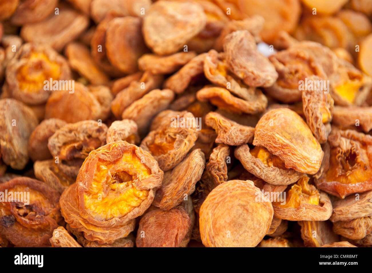 Sun-dried apricots in the market Stock Photo - Alamy