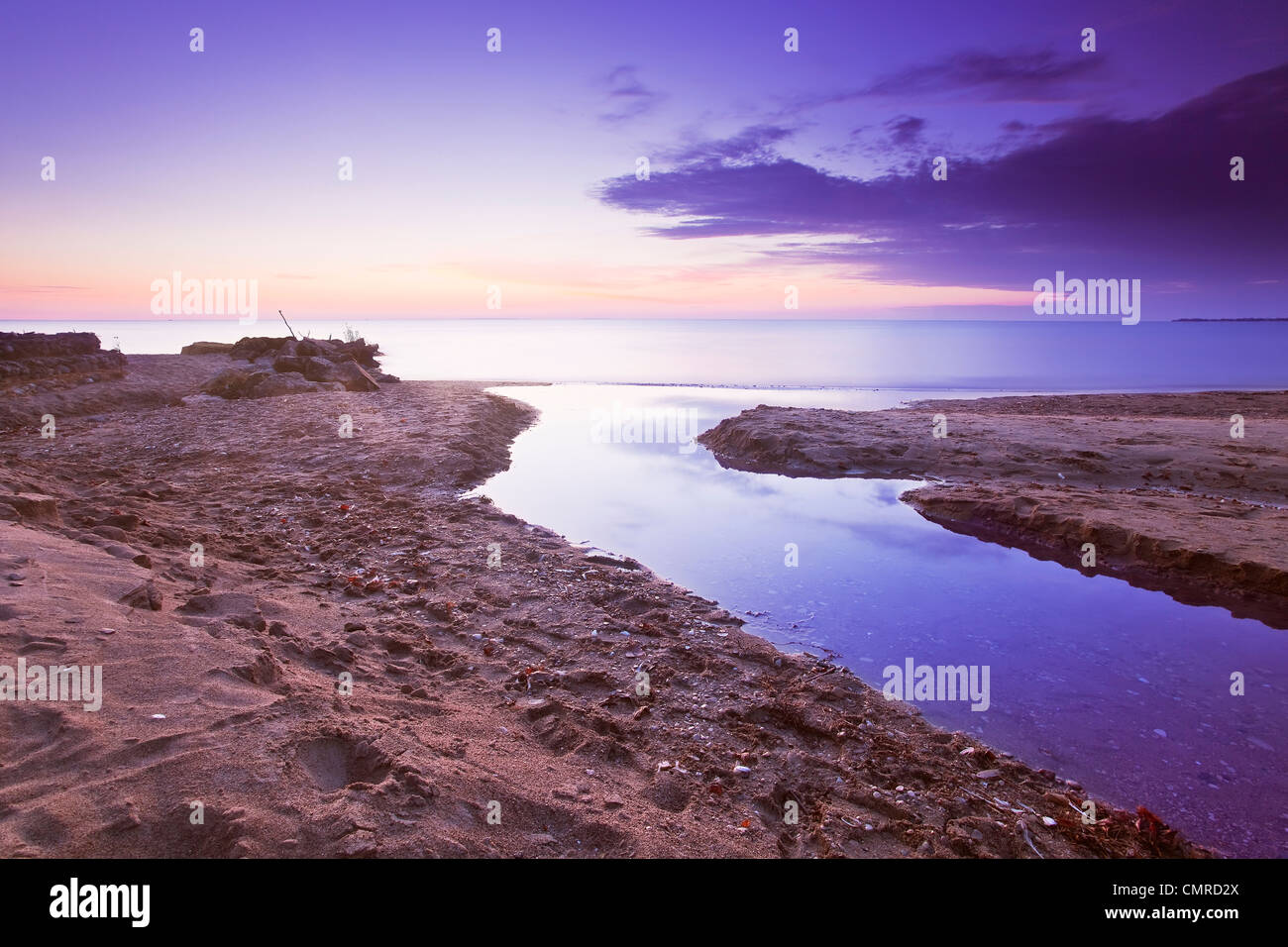 Stream feeding into Lake Winnipeg at dawn, Gimli, Manitoba, Canada ...