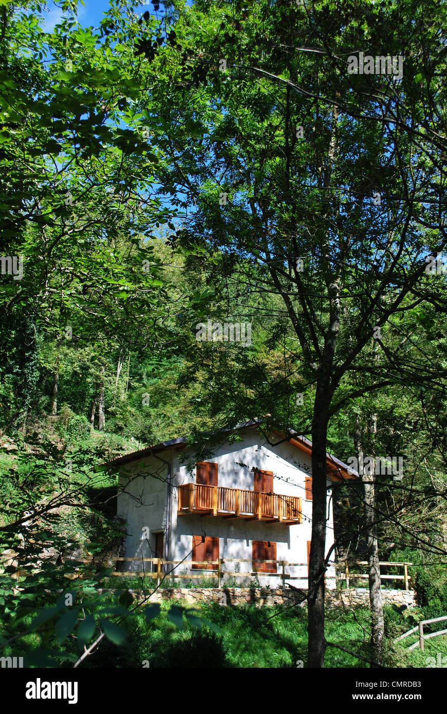 Small country house in the forest, Italy Stock Photo - Alamy