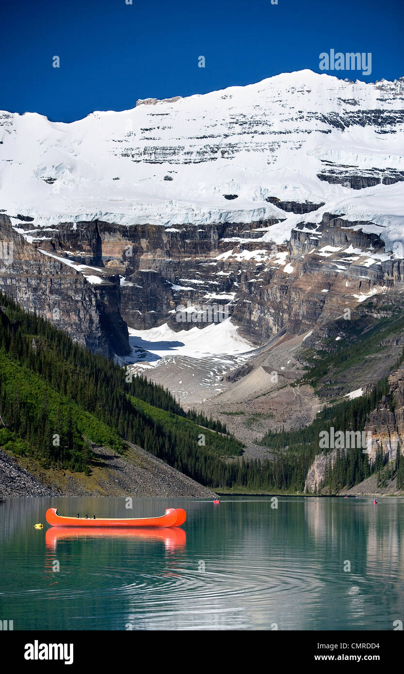 Canoe on Lake Louise with Victoria Glacier in the background, Banff ...