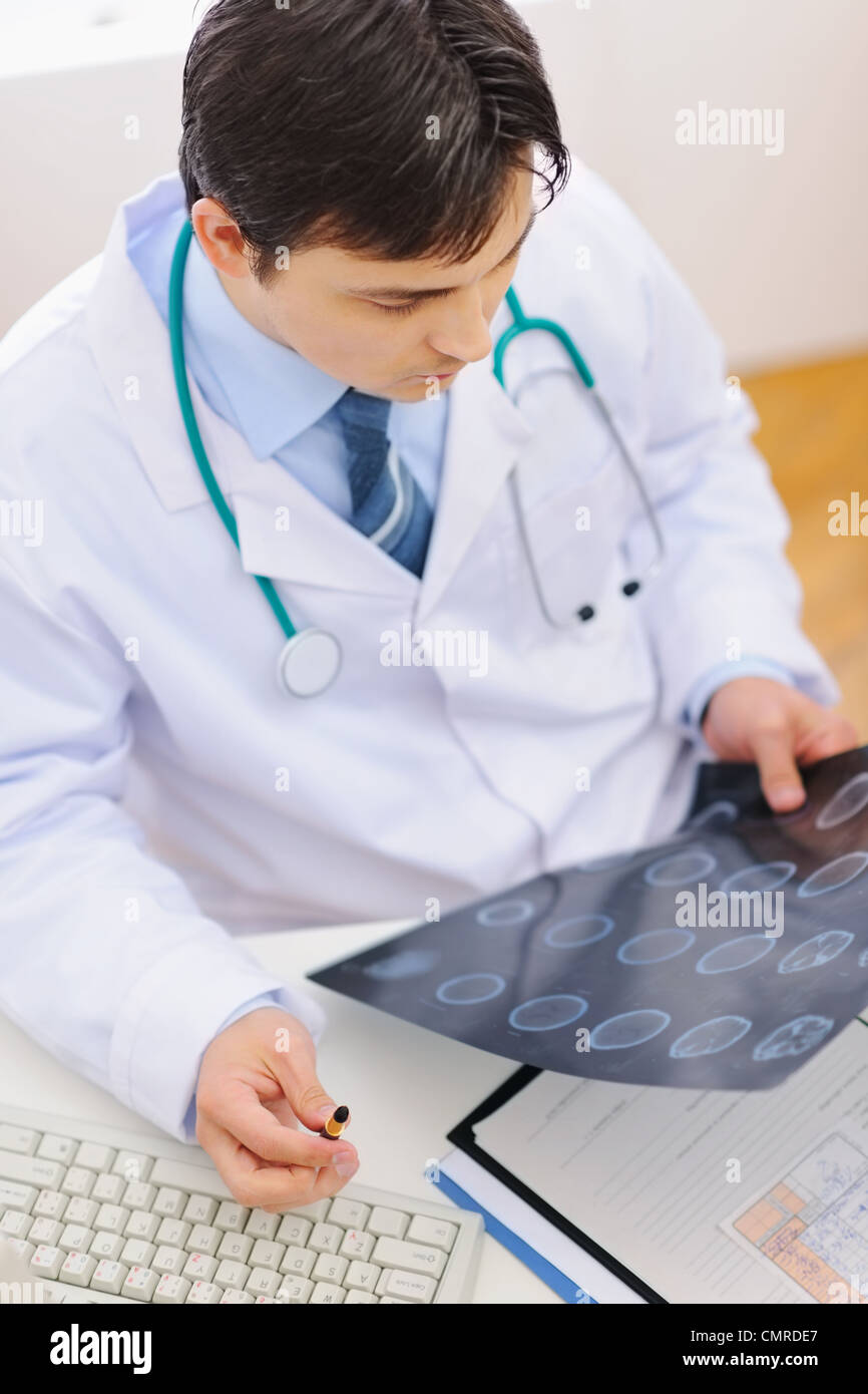 Medical doctor examine mri. Top view Stock Photo - Alamy
