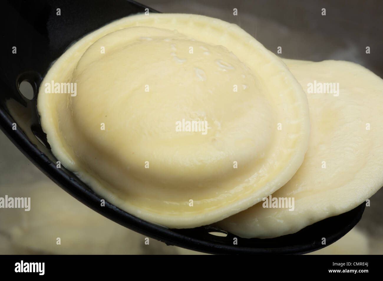 Round Cheese Ravioli Stock Photo - Alamy