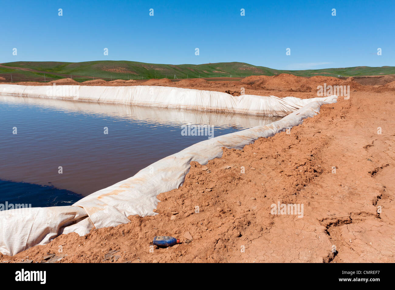 The surface of the well site with the drilling mud in Russia Stock ...