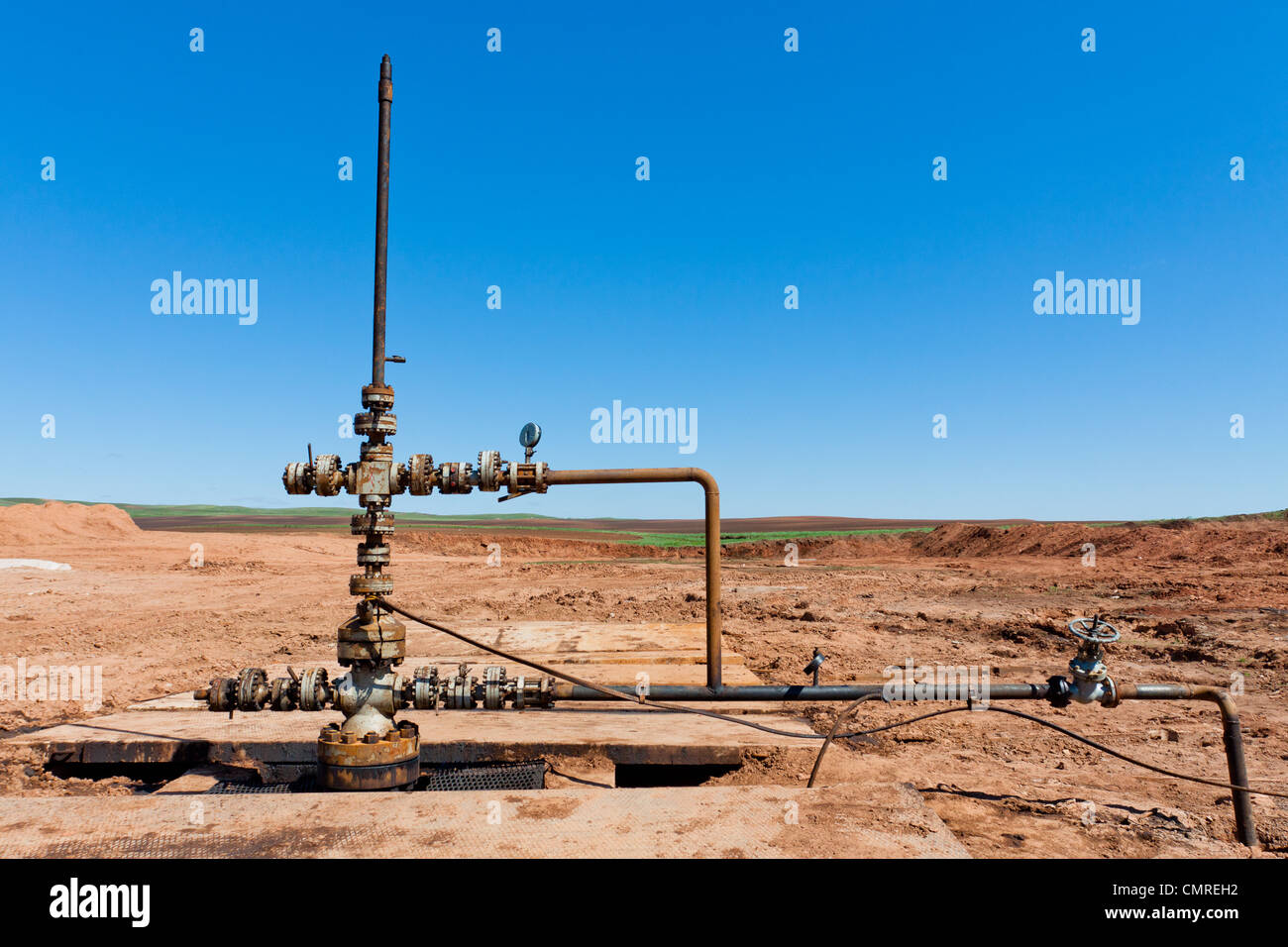 Oil Wellhead in the oil field Stock Photo - Alamy