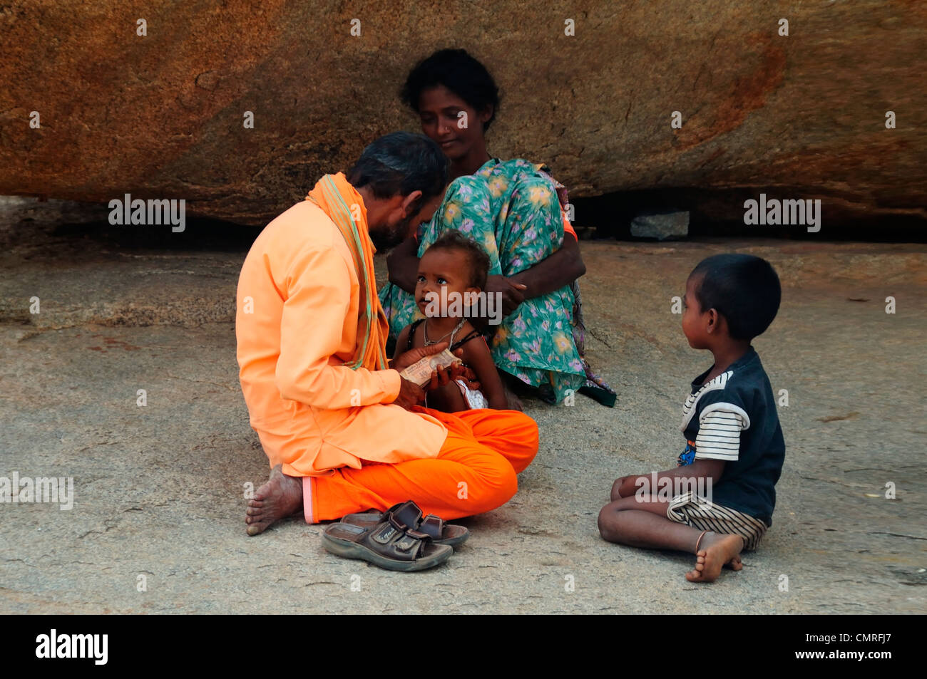 a family on rock Stock Photo - Alamy