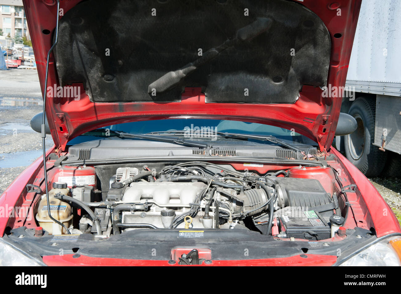 Looking under the hood of a vehicle at the engine Stock Photo - Alamy