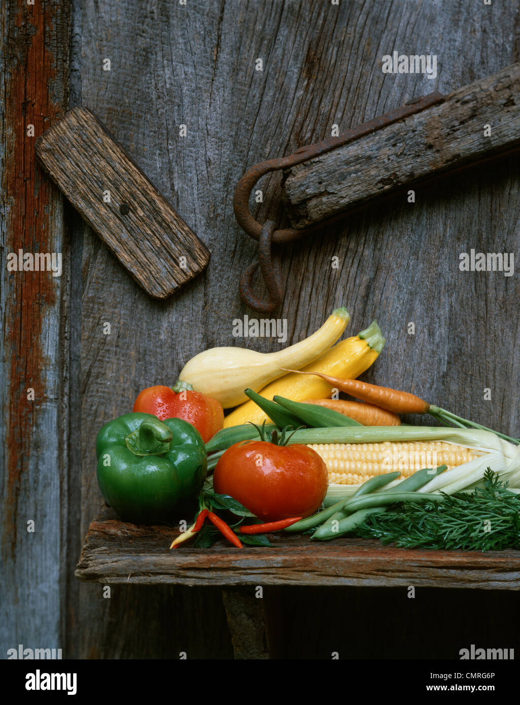 1980s VEGETABLE ARRANGEMENT ON BARN WOOD Stock Photo - Alamy