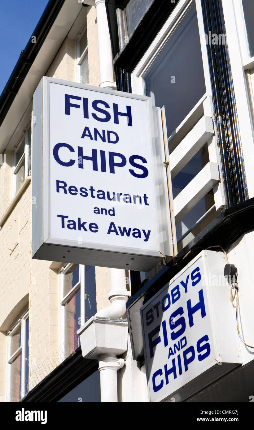 UK fish and chip shop sign Stock Photo - Alamy