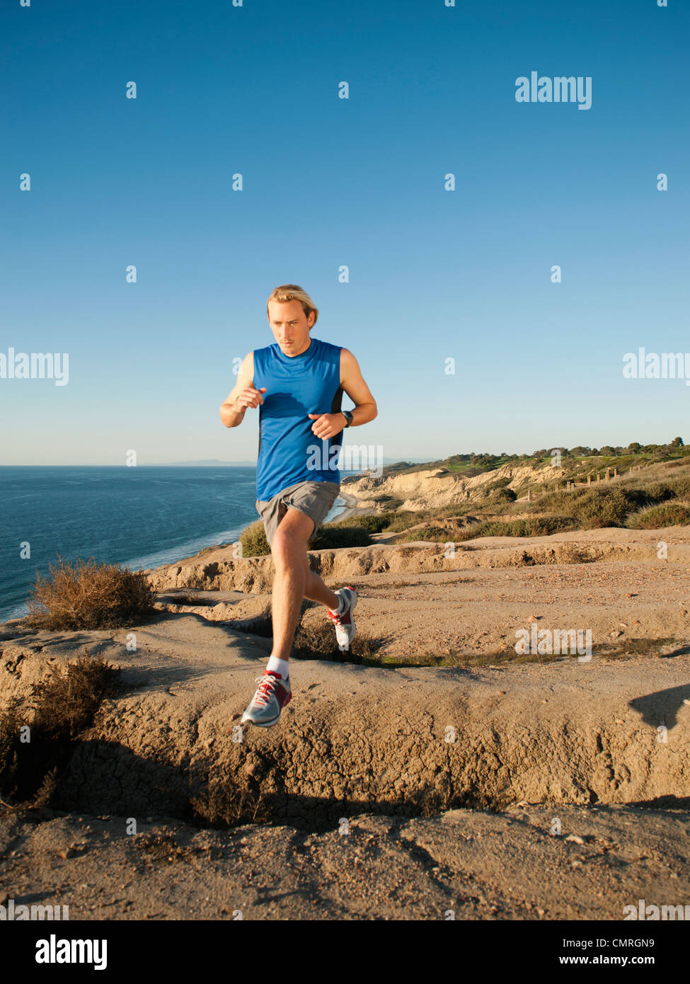 Man running in sea hi-res stock photography and images - Alamy