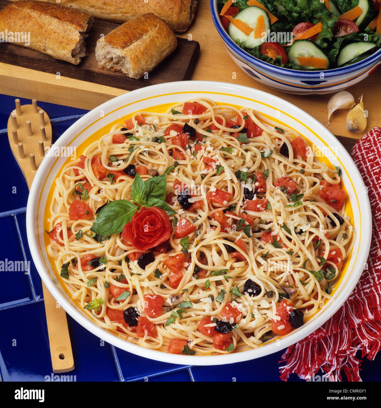 1990s PASTA WITH OLIVES TOMATOES AND BASIL Stock Photo - Alamy