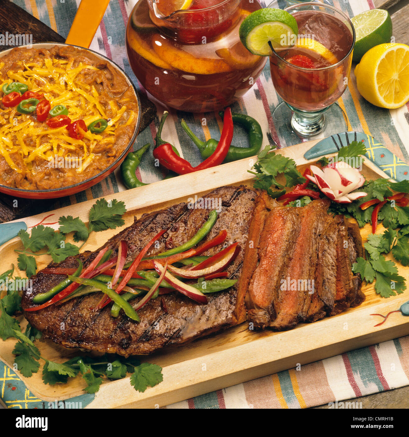 1990s MEXICAN BBQ GRILLED STEAK, REFRIED BEANS AND SANGRIA Stock Photo ...