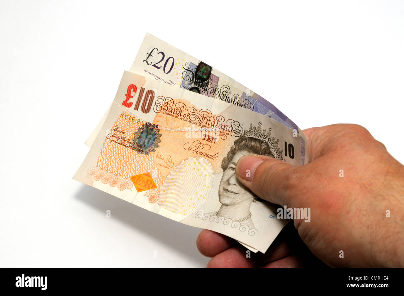 Great Britain UK pound bank notes in hand Stock Photo - Alamy