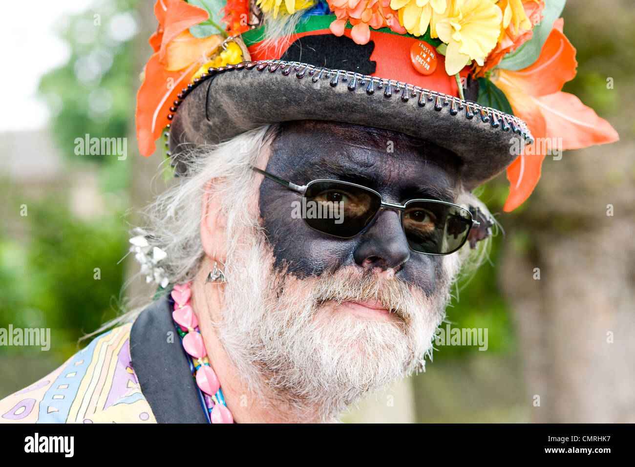 Portrait of a traditional black faced morris dancer at Bakewell Day of ...