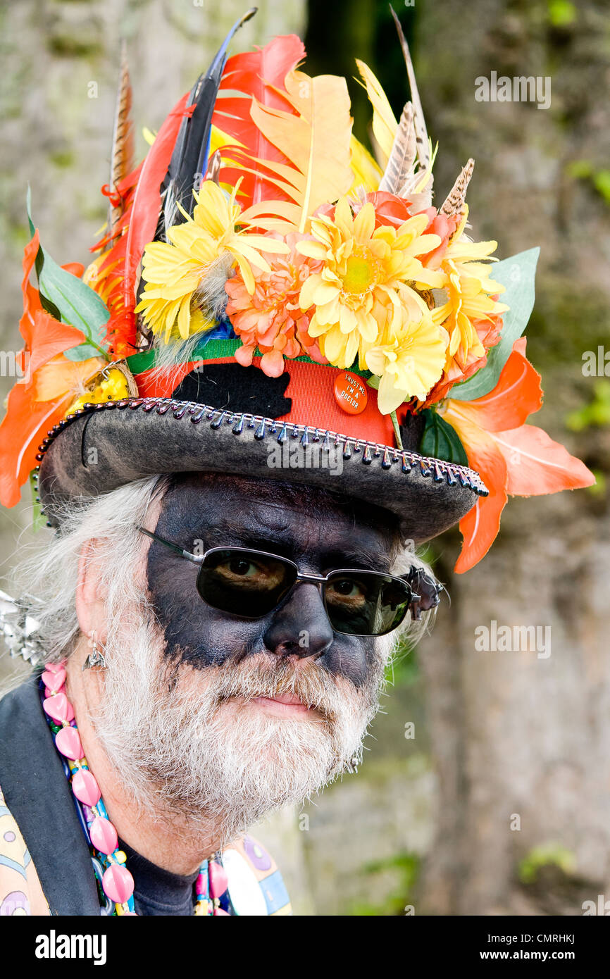Portrait of a traditional black faced morris dancer, with a colourful ...