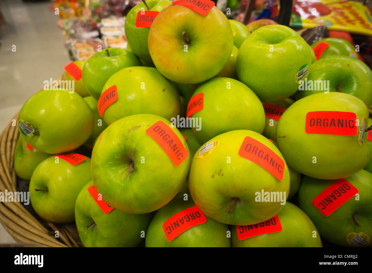 Organic apples are seen in a supermarket produce department in New York ...