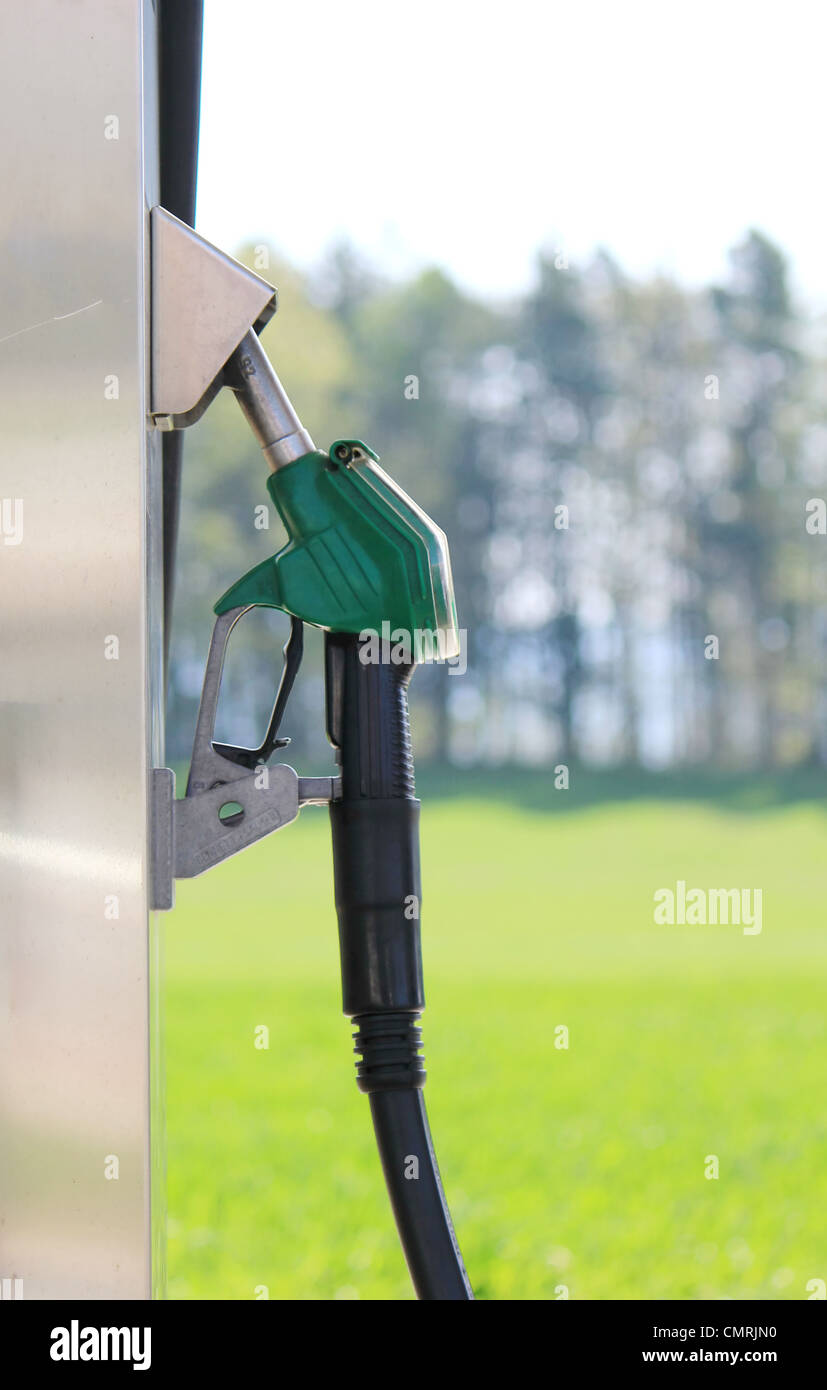 Side of one gas pump nozzles on a petrol station Stock Photo - Alamy