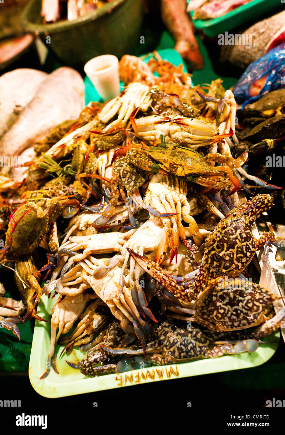 Fresh crabs sit on a tray in the Cubao Farmer's Market, Quezon City ...