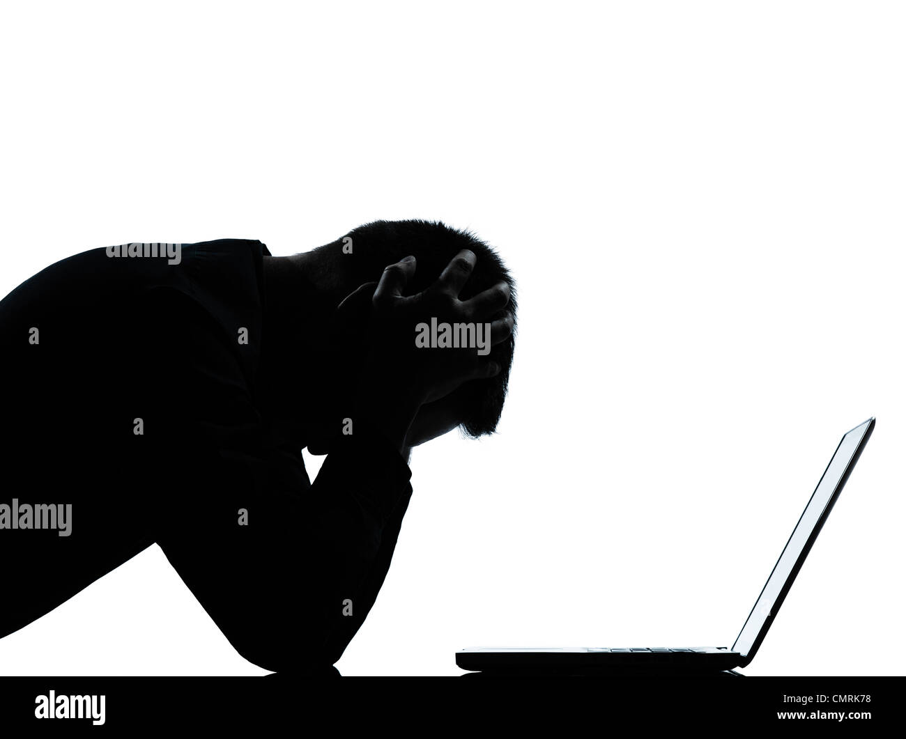 one caucasian business man computing computer laptop despair sad ...