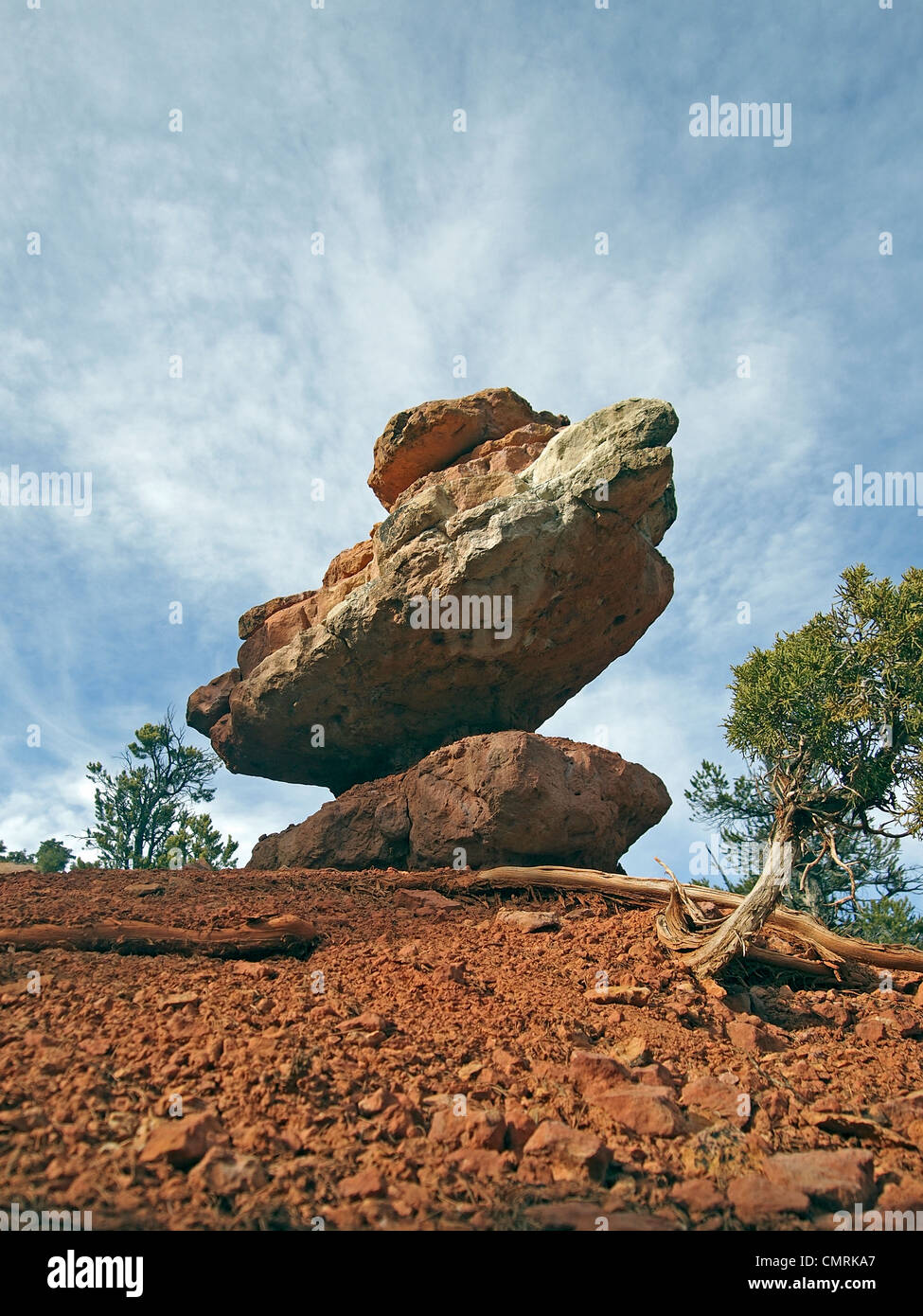 A large chunk of sandstone is balanced above the ground Stock Photo - Alamy
