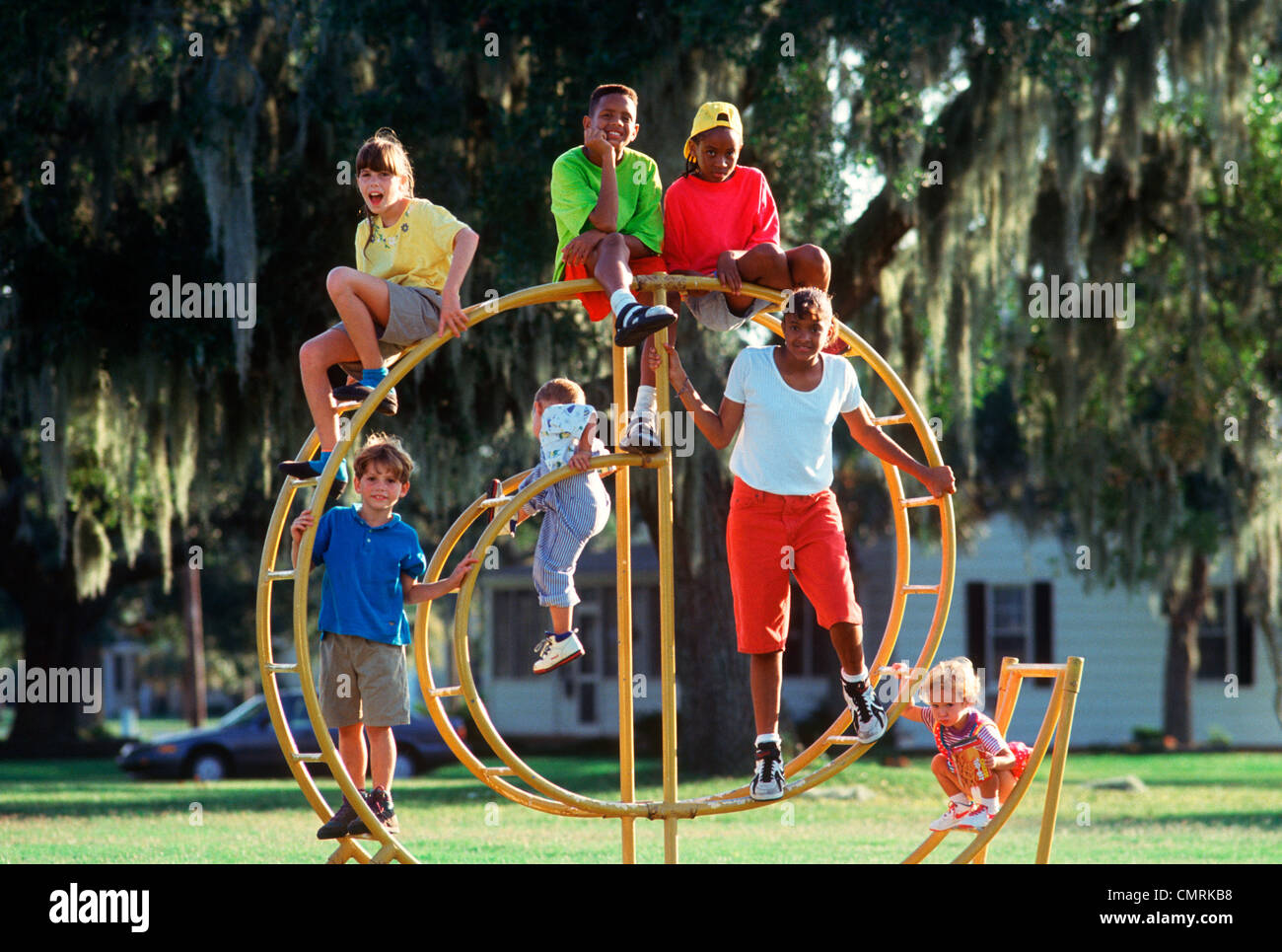 MULTI ETHNIC BOYS AND GIRLS ON PLAYGROUND Stock Photo - Alamy